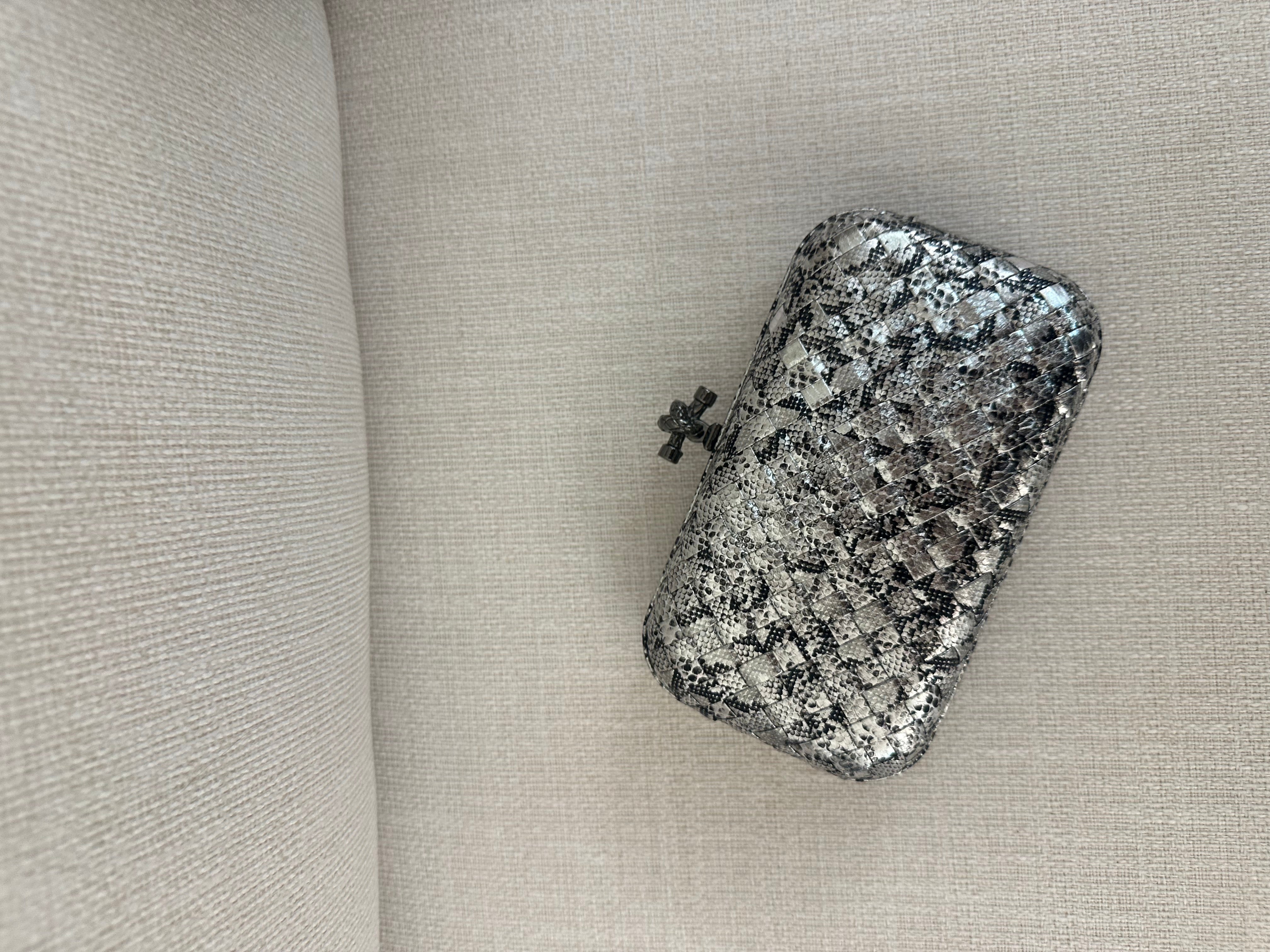 Limited silver clutch