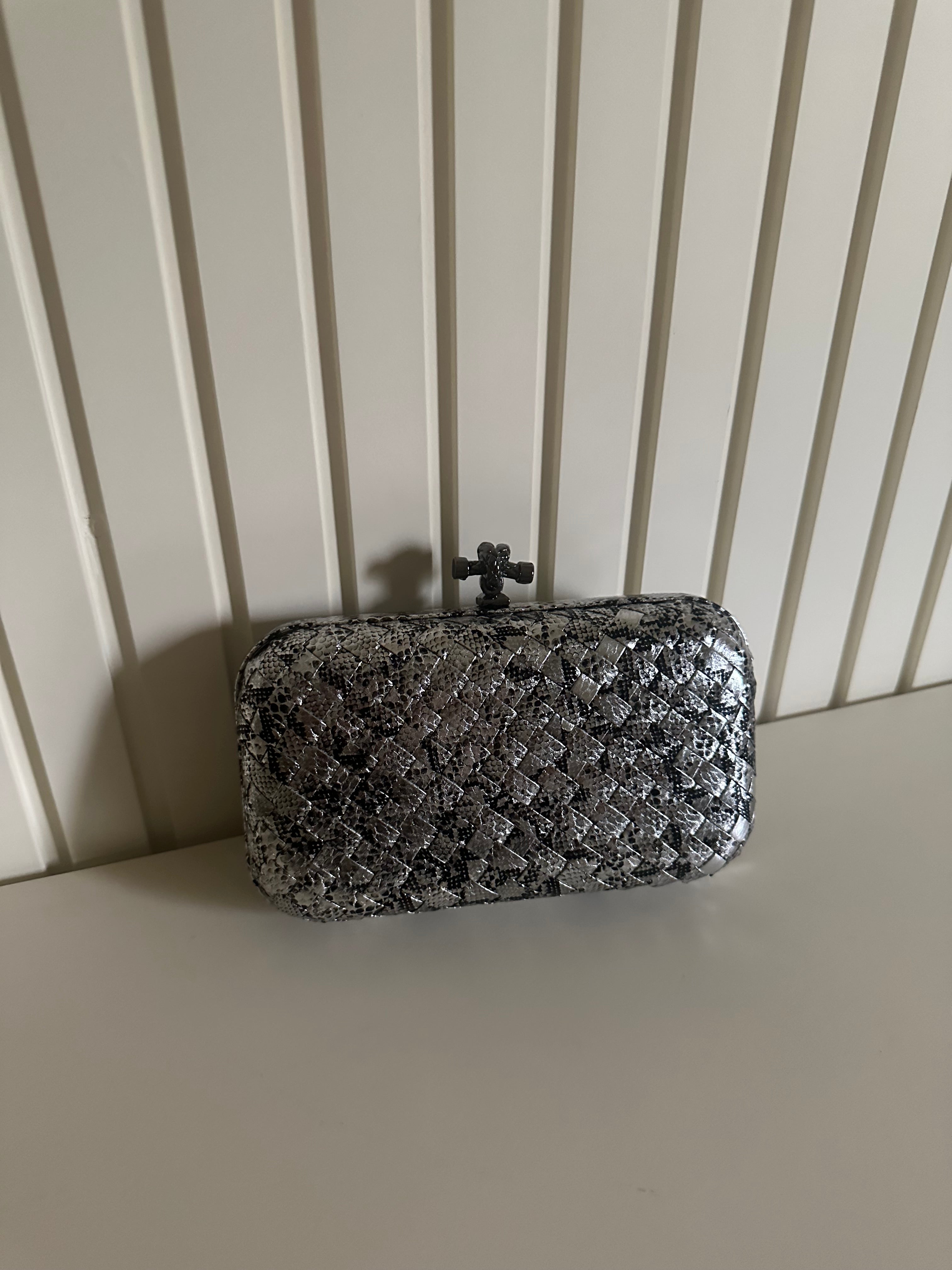 Limited silver clutch