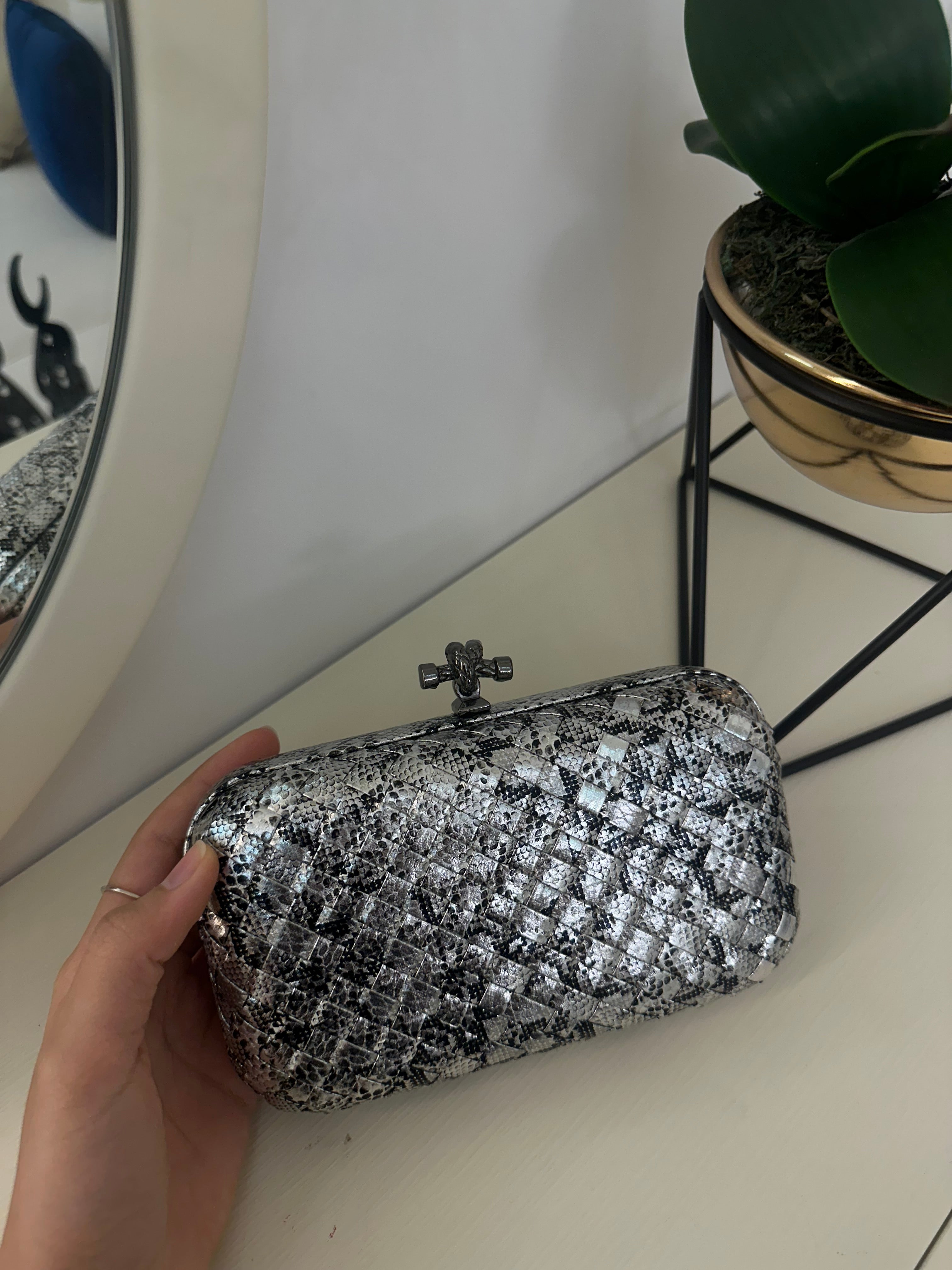 Limited silver clutch